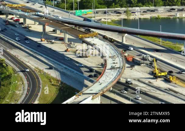 Aerial view of busy american freeway road interchange under ...