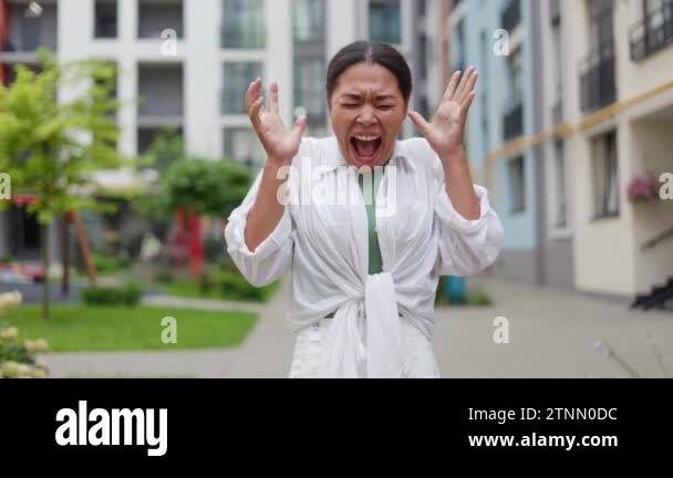 Portrait of Angry African American Girl Standing Outside Screaming ...