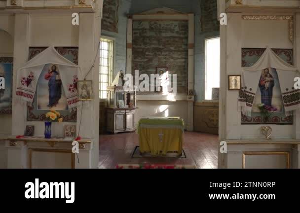 Zoom out view of an immense abandoned Orthodox church overflows with a ...