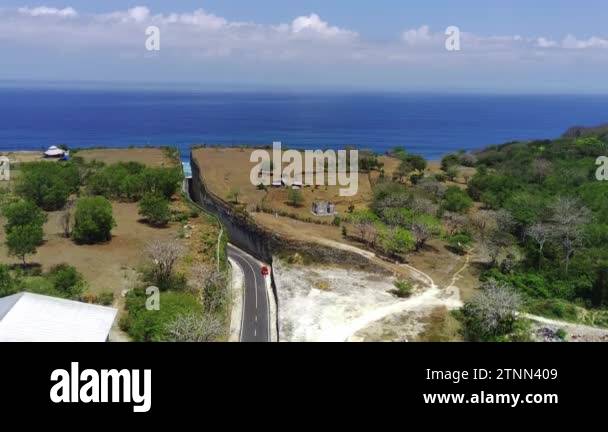 A drone flies above the Pandawa Beach area, capturing the expanse of ...