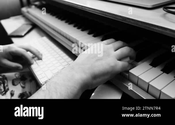 Creative music production: expert musician hands creating with mouse ...