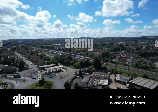 Beautiful Aerial Footage of Train on Tracks Passing Through Luton city ...