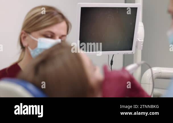 Oral health, mouth inspection, dental procedure. With intraoral camera ...