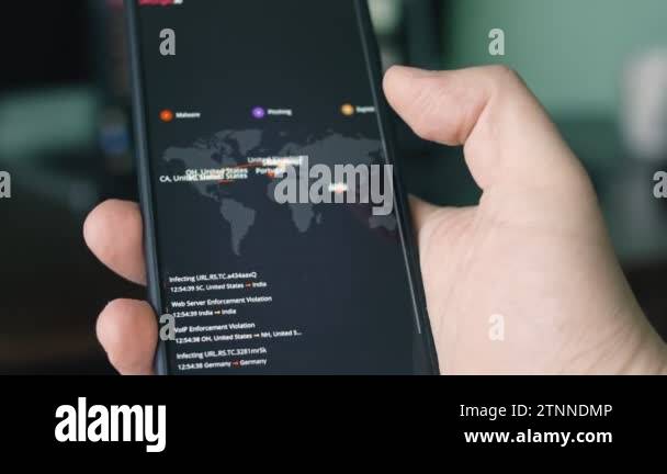 Cyber attack map navigation on smartphone. Displays Show Various ...