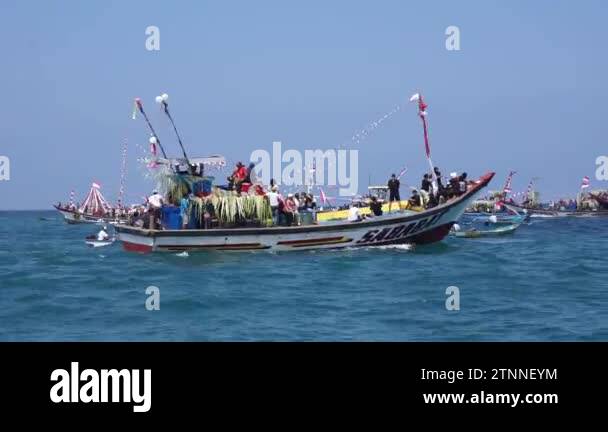 Petik laut ceremony on tambakrejo beach. Petik laut is Javanese ...