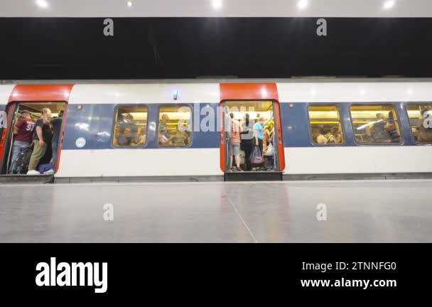 Paris, France. June 25 2023. People board crowded trains in metro ...