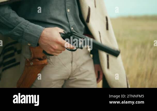 Cowboy with a hand gun Stock Videos & Footage - HD and 4K Video Clips ...
