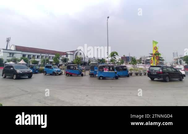 Jakarta, Indonesia - July 22, 2023: Row of bajaj parked on the side of ...