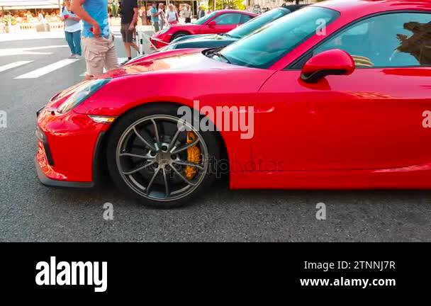 Red Porsche Cayman GT4 Side View Stock Video Footage - Alamy