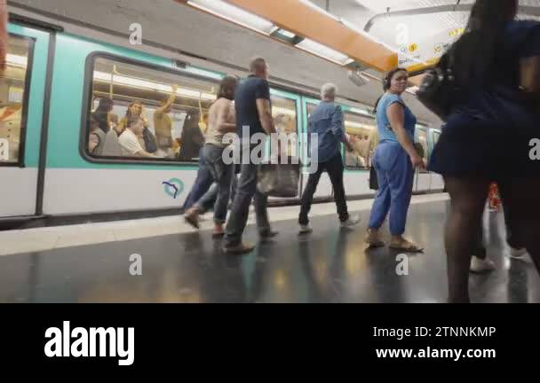 Paris, France. June 25 2023. People board crowded trains in metro ...