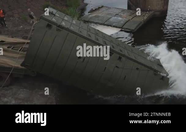 Pontoon bridge of the Ukrainian army. Installation of a temporary ...