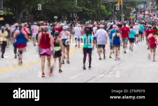 Atlanta, GA / USA July 4, 2023: Timelapse shows thousands of runners ...