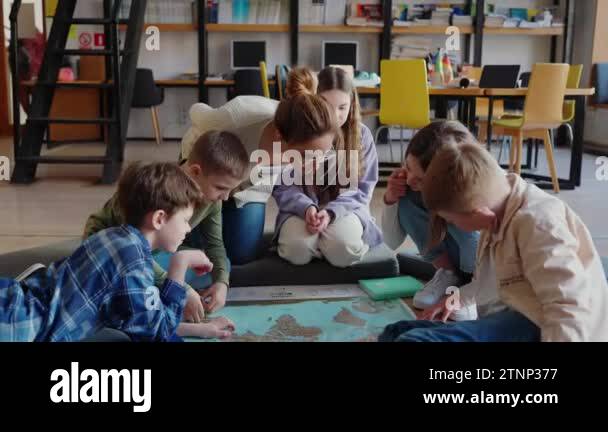 Children sitting map Stock Videos & Footage - HD and 4K Video Clips - Alamy