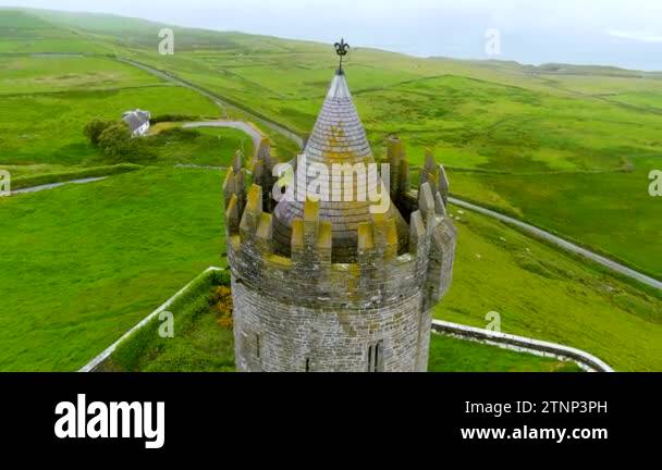 Doonagore Castle aerial foggy view, iconic landmark, one of the most ...
