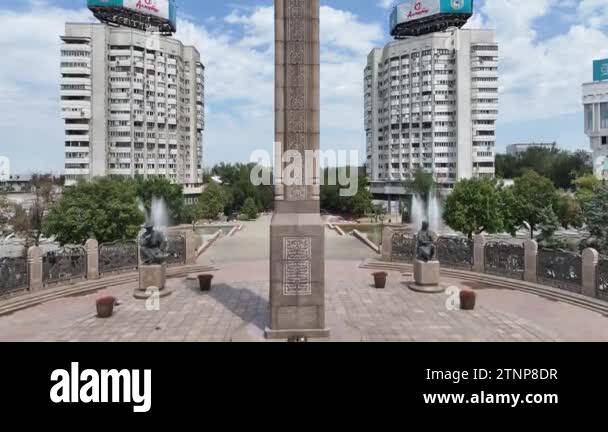 Aerial video of the bronze sculpture of the Golden Man on top of the ...