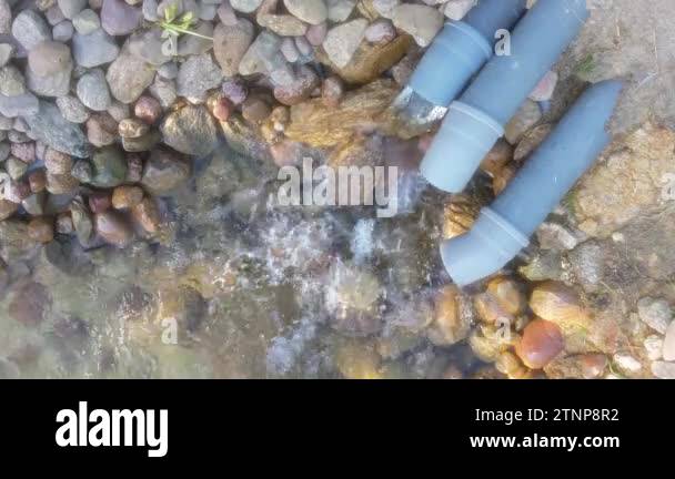 Fresh drinking water from the artesian well comes through a water pipe ...