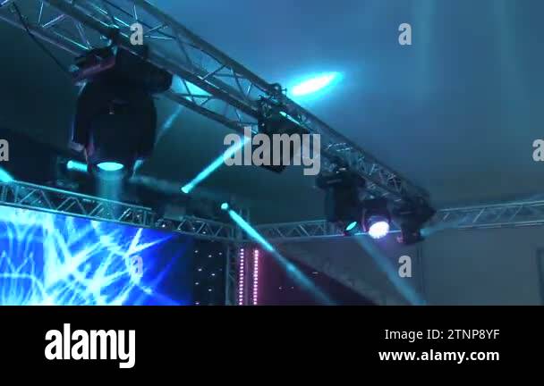 Stage lights at the concert with fog, Stage lights on a console ...