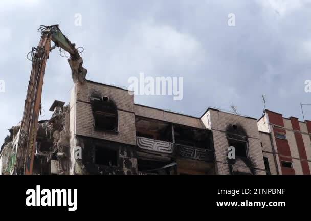 Facade of a residential abandoned multi-storey building after a strong ...