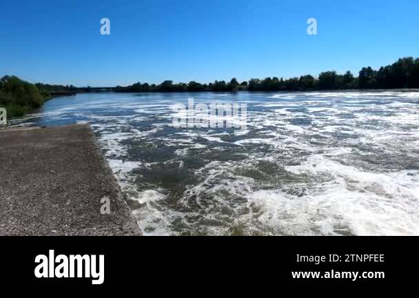 Strong current in the Danube river after opening the overflow at a lock ...