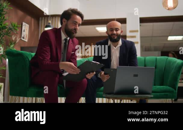 Staff members attend Stock Videos & Footage - HD and 4K Video Clips - Alamy