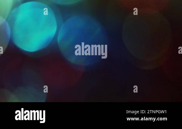 Abstract dark blue bokeh loop background effect overlay. Soft toned ...