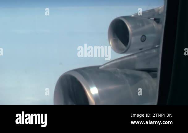 Close-up view of the two silver engines of a Boeing 747 Jumbo Jet ...