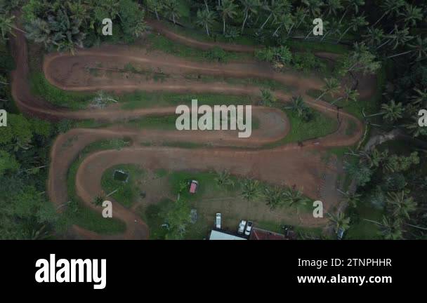 Shooting from top to bottom on motocross, young riders on Enduro bikes ...