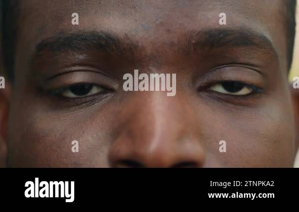 Close up cropped view detail ad male African American ethnic man dark ...