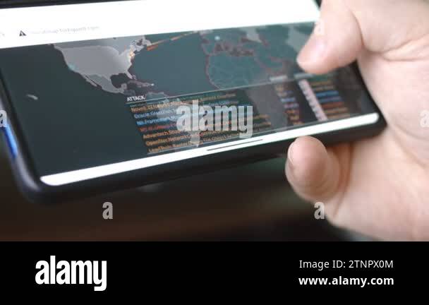 Cyber attack map navigation on smartphone. Displays Show Various ...