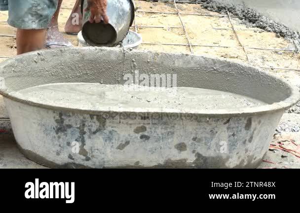 Worker pouring cement in Stock Videos & Footage - HD and 4K Video Clips ...