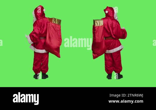 Santa claus character does ad against full body greenscreen backdrop ...