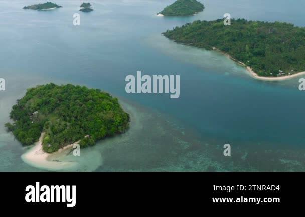 Tropical Islands with turquoise water atoll and corals. Once Islas in ...