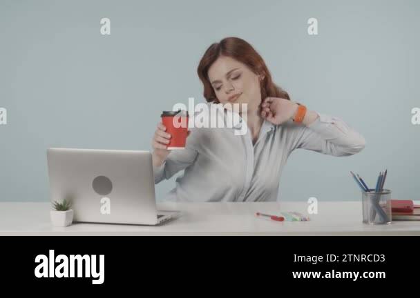 Medium isolated video of a young sleepy tired woman stretching ...