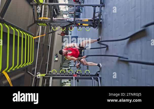 vertical shot a determined, sporty, and muscular young man is fully ...