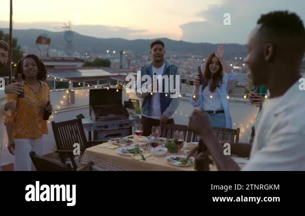 Multiracial group of young friends dancing enjoying summer party at ...