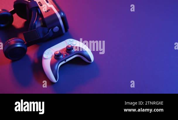 Video of close up of video game pad controller and vr headset with copy ...