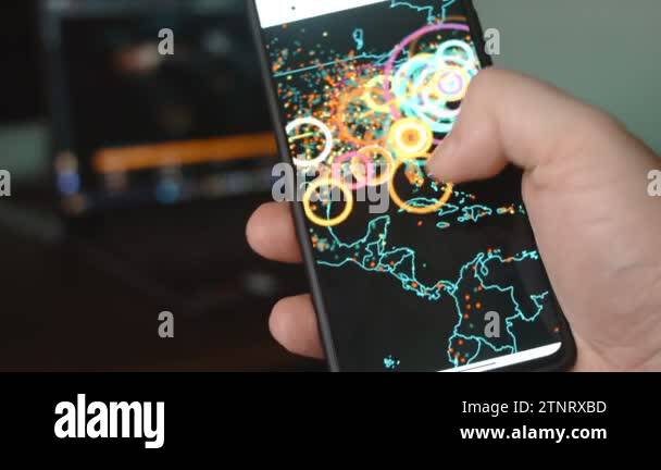 Cyber attack map navigation on smartphone. Displays Show Various ...