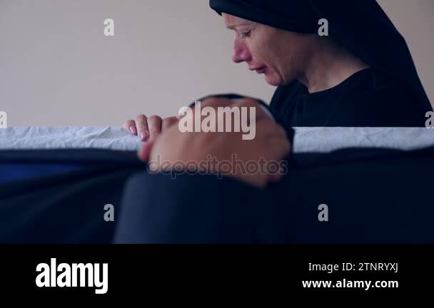 funeral, sadness and mourning concept - sad woman talking and crying ...