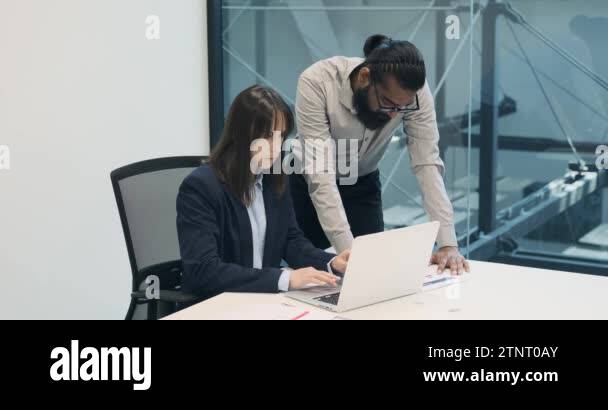 Dynamic duo of entrepreneurs collaborating on work tasks within a ...