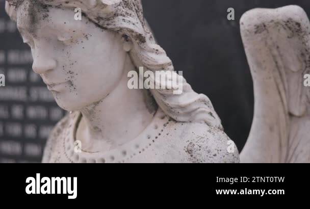 Graveyard, angel statue and tombstone in cemetery for death ceremony ...