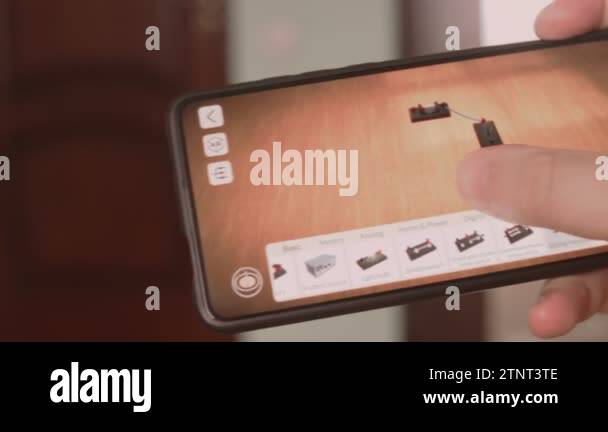 Images of types of circuit elements on mobile phone screen Stock Video ...