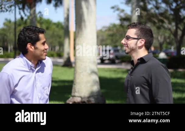 Chat outdoors Stock Videos & Footage - HD and 4K Video Clips - Alamy