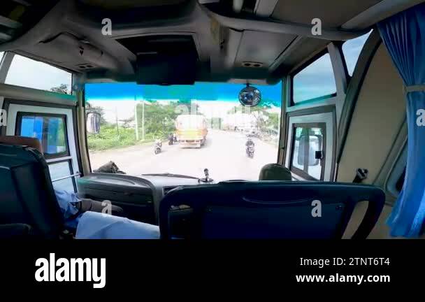 Bus riding in an intercity bus. Bus traveling View from the front seat ...