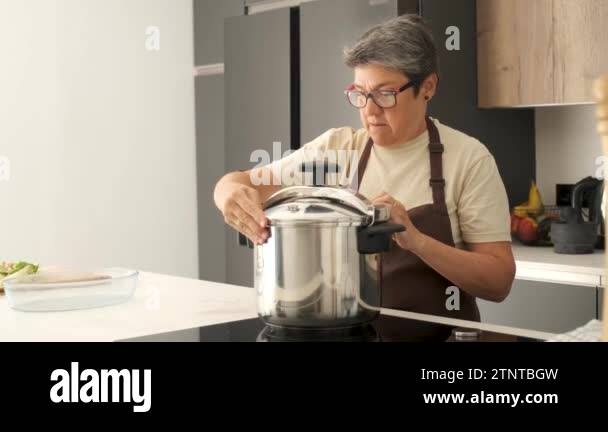 How to use a pressure cooker Stock Videos & Footage - HD and 4K Video ...