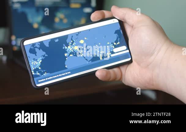 Cyber attack map navigation on smartphone. Displays Show Various ...