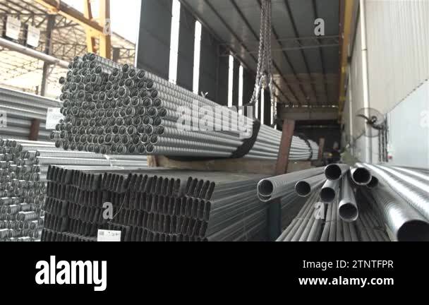 Chain Lowering After Placing A Bundle Of Aluminum Duct Pipes In ...