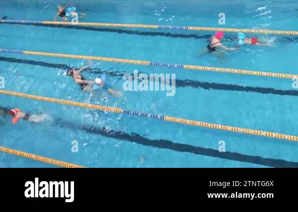 Rome, Italy, July 18, 2023: Children learn to swim in the pool ...