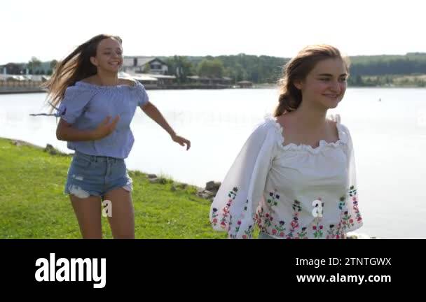 Two girls doing piggyback Stock Video Footage - Alamy