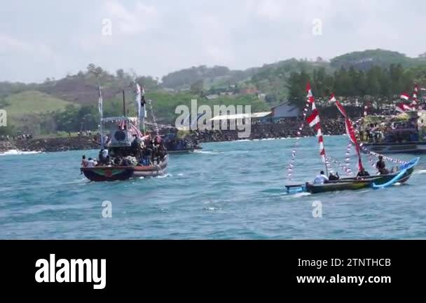 Petik laut ceremony on tambakrejo beach. Petik laut is Javanese ...