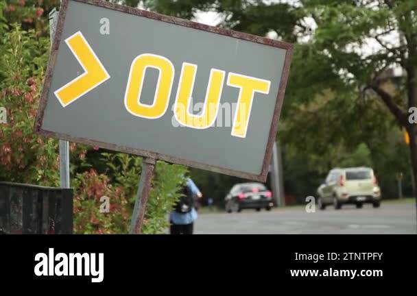 out word caption text horizontal gray yellow crooked out sign exit ...